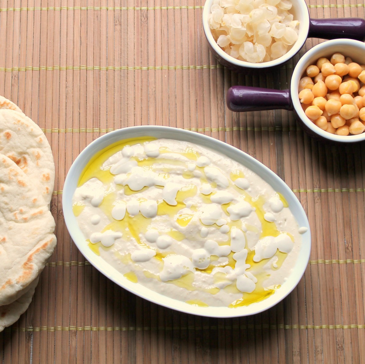 Creamy hummus with lemon garlic sauce - Happy Veggie Kitchen