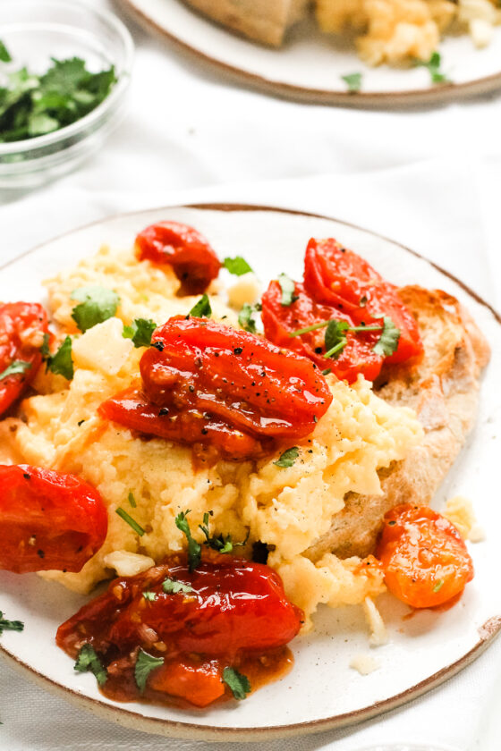 Scrambled Eggs with Tomatoes, Cheese & Cilantro - Happy Veggie Kitchen