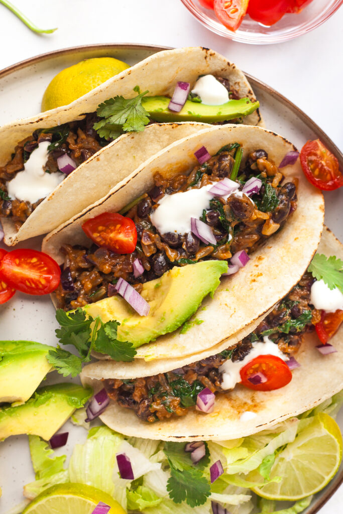 Cheesy Rice, Bean & Spinach Tacos - Happy Veggie Kitchen