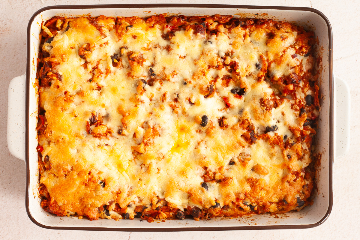 Cheesy Rice & Refried Bean Casserole - Happy Veggie Kitchen